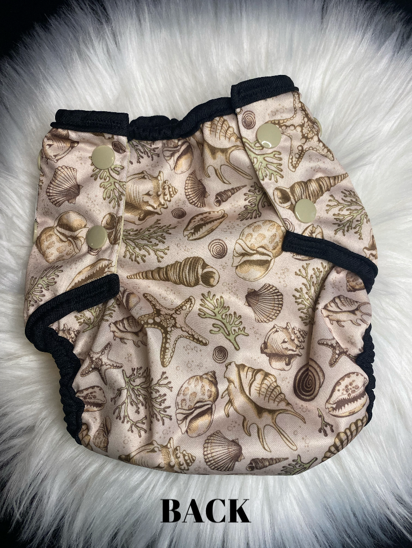 One Size Adjustable Swim Diapers "Neutral Sea Shell" – Sweet Cheeks Diaper